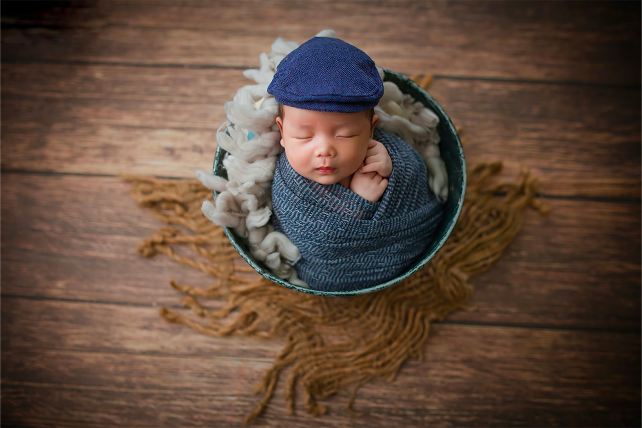 Newborn Photography: nascita, sviluppo, attrezzatura.